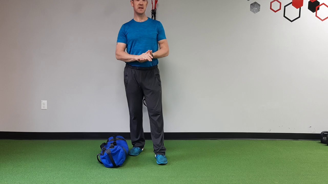 Sandbag reverse lunge with rotation - YouTube