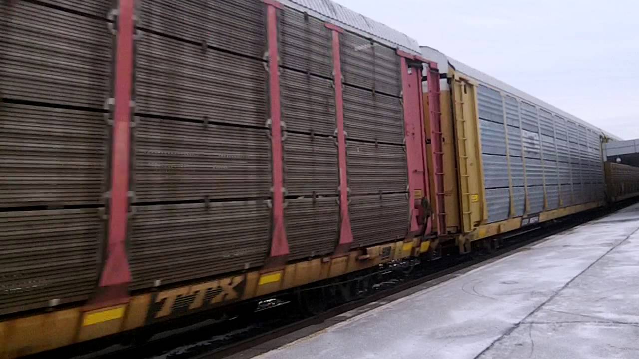 CP 244 w/ CP 8709 & NS 9693 lead this long EB Autorack train thru ...