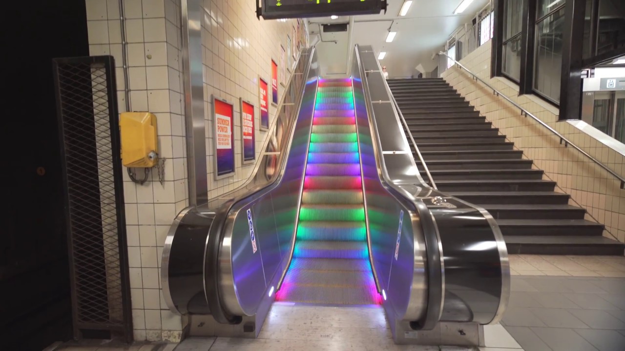 Sweden, Stockholm, S:t Eriksplan subway station, 1X rainbow escalator ...