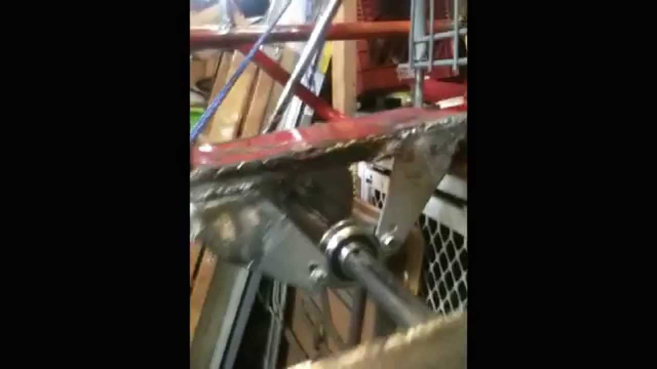 Go kart middle axle hanger made from shopping cart wheel bracket ...