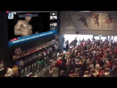 Crowd reacts to Ricardo milos interrupting President of Peru