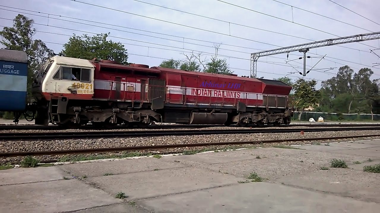 19803 Kota - Jammu Tawi Express led by RED EMD GT46ACe of Tughlakabad ...