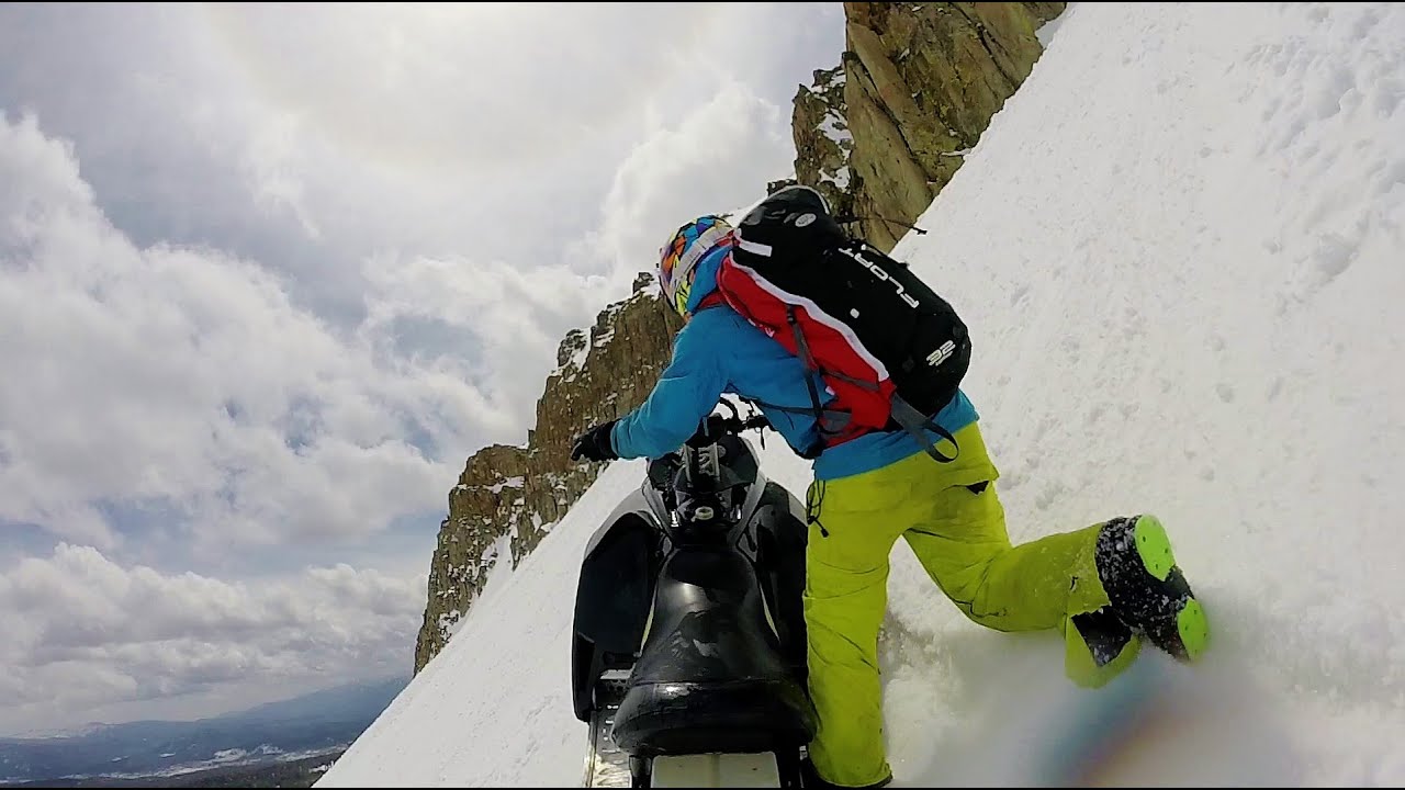 Snowmobile Mountain Riding in the Highlands of the Rockies Backcountry ...