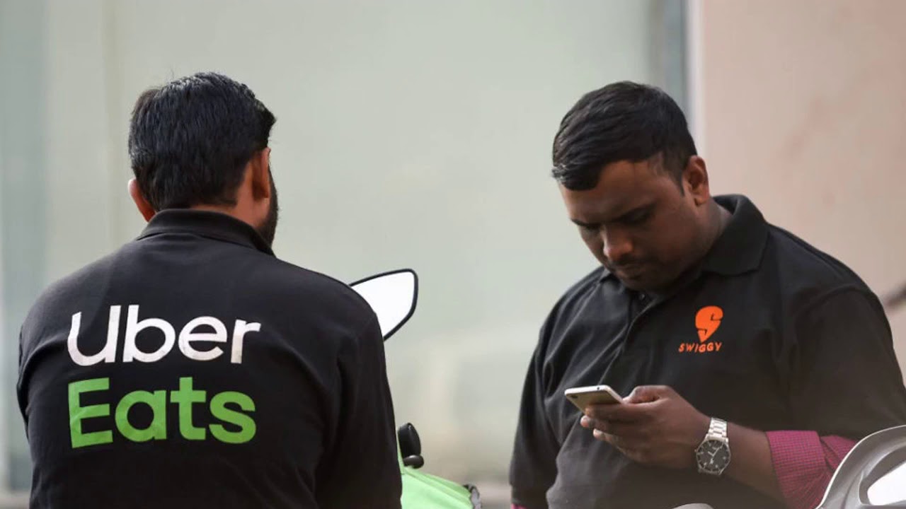 Uber sells Indian food delivery business to Zomato - YouTube