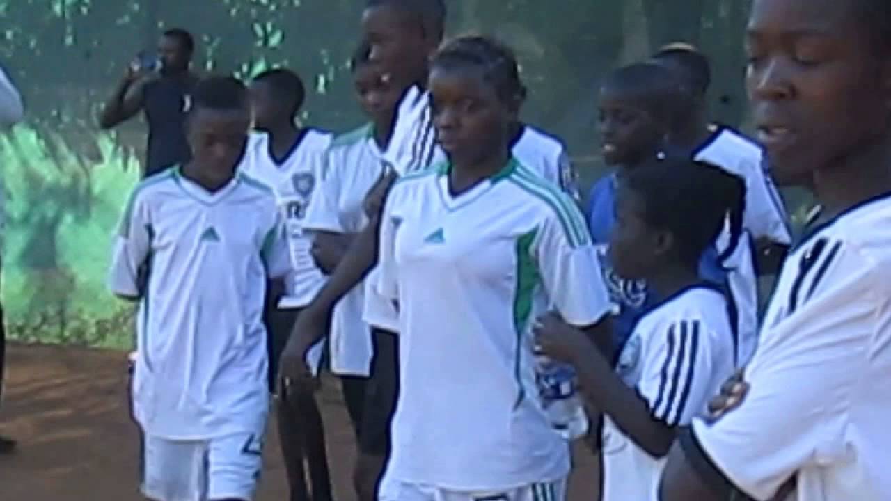 Michael-Ray Pallares teaching tennis Mukuni Village Orphans 1 - Zambia ...