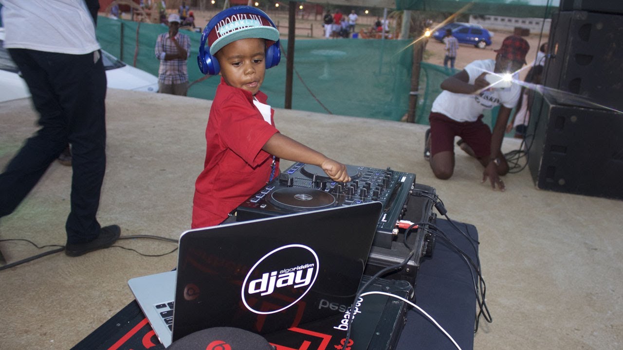 Kid DJ Rocking The Crowd Crazy With Some Dance Music Behind The Decks ...