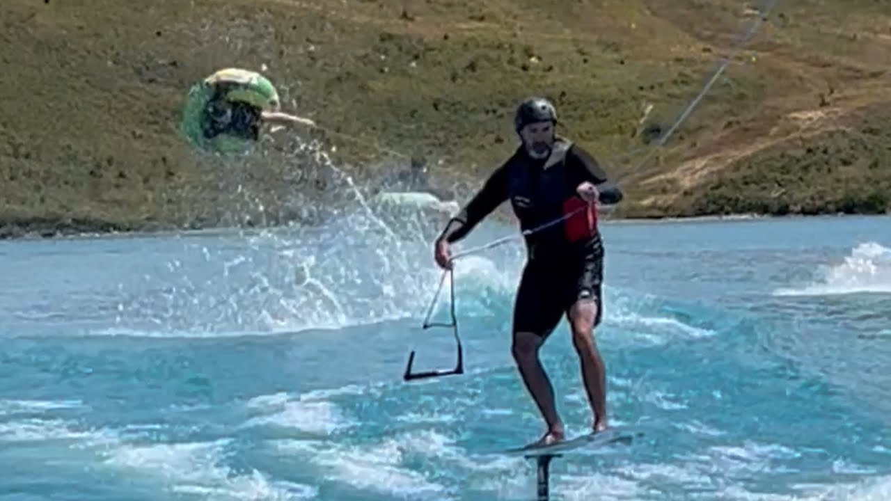 Kids ejected off water tube on boat wave - YouTube