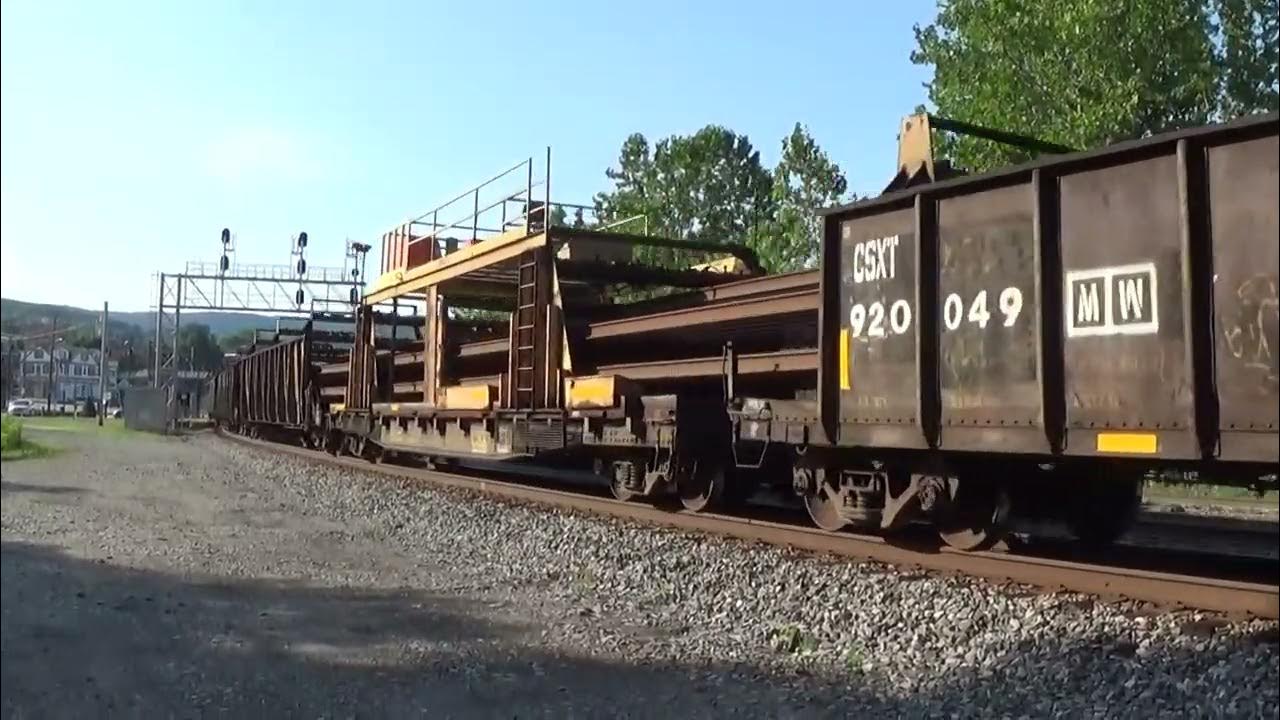 CSX W 010 03 MOW Rail train departs Connellsville yard north by CP Sodem 7-3-24 CW44AC leads ...