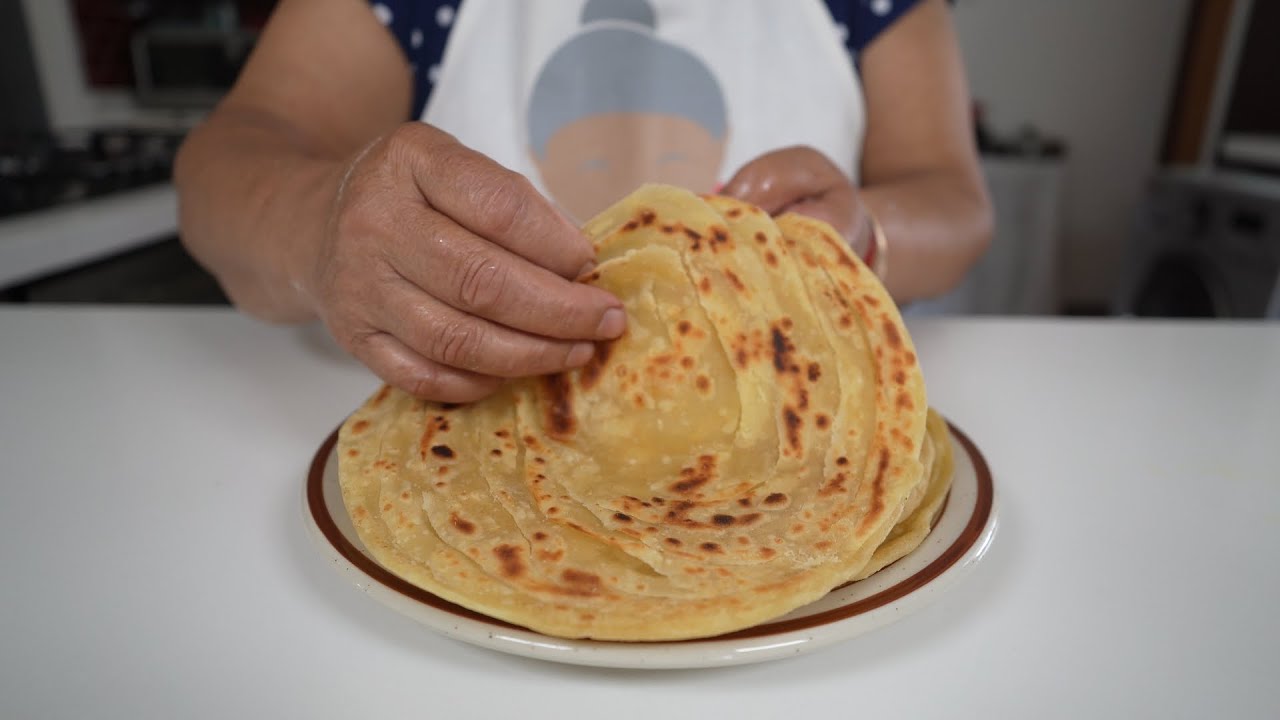 Making crispy and flaky paratha plus a bonus unda kathi roll recipe ...