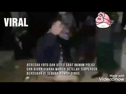 Diarak Warga...!!!Oknum Polisi dan Bidan berbuat mesum.