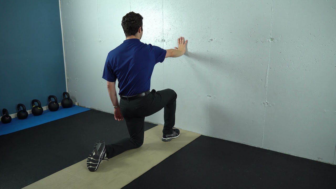 1/2 Kneeling Ipsilateral Wall Reach - YouTube