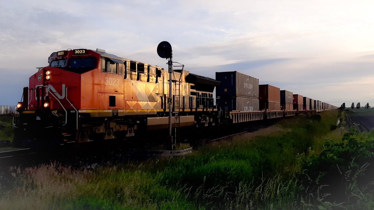 A Stack At Golden Hour! CN 3023 Tier 4 ET44AC GEVO Leads Container ...