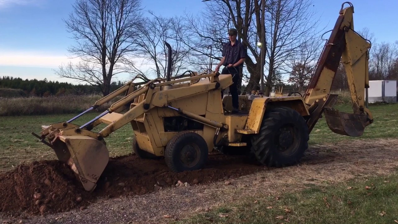 Driveway work with GMC Dump truck and Clark Backhoe - YouTube