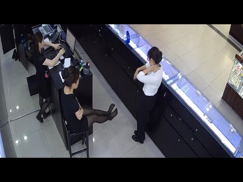 The jewelry store hostess in black nlyon relax her feet - YouTube