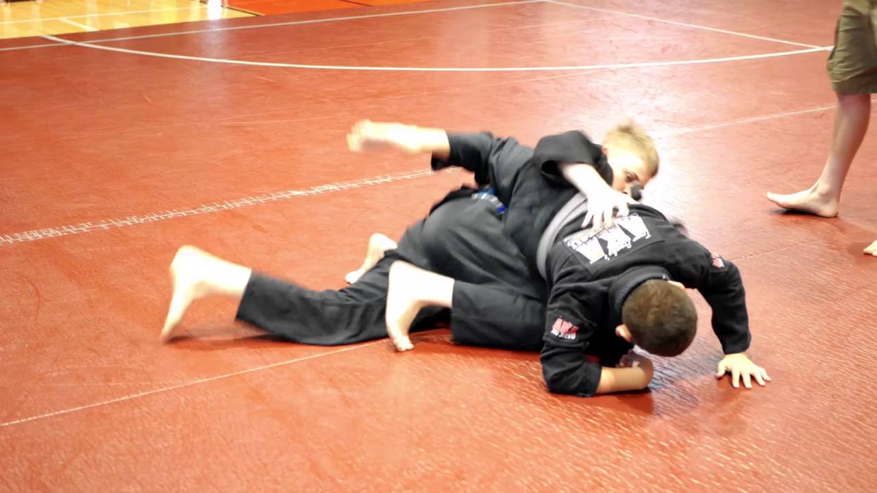 Mitchell First Jiu Jitsu Tournament Fight - YouTube