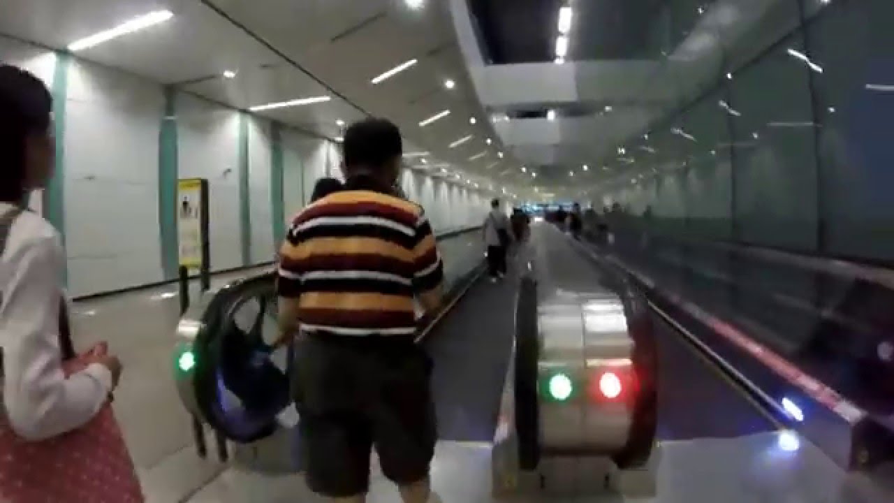 Taking the MRT train in Singapore - YouTube