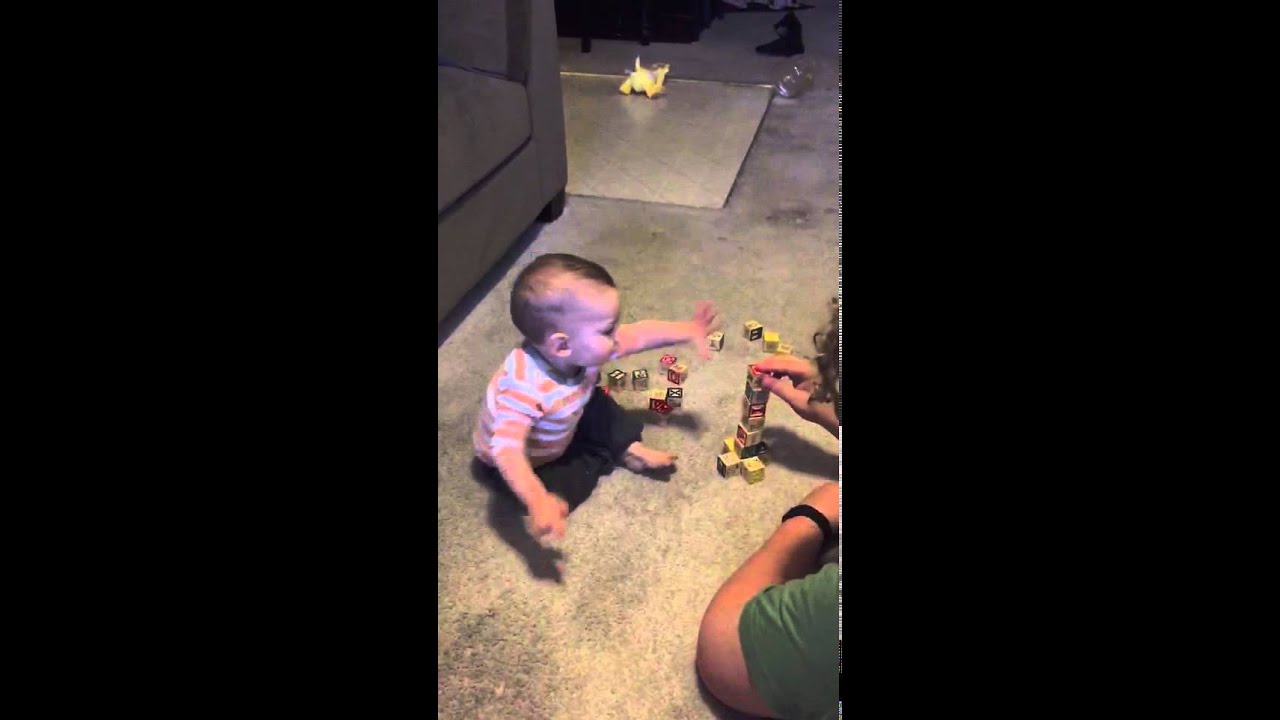 Baby Laughs Over Knocking Down Blocks - YouTube