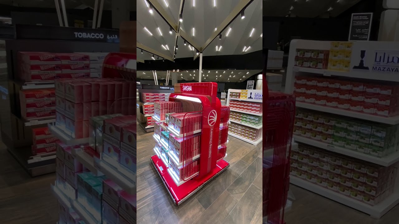Cigarette stalls in Kuwait Airport - YouTube