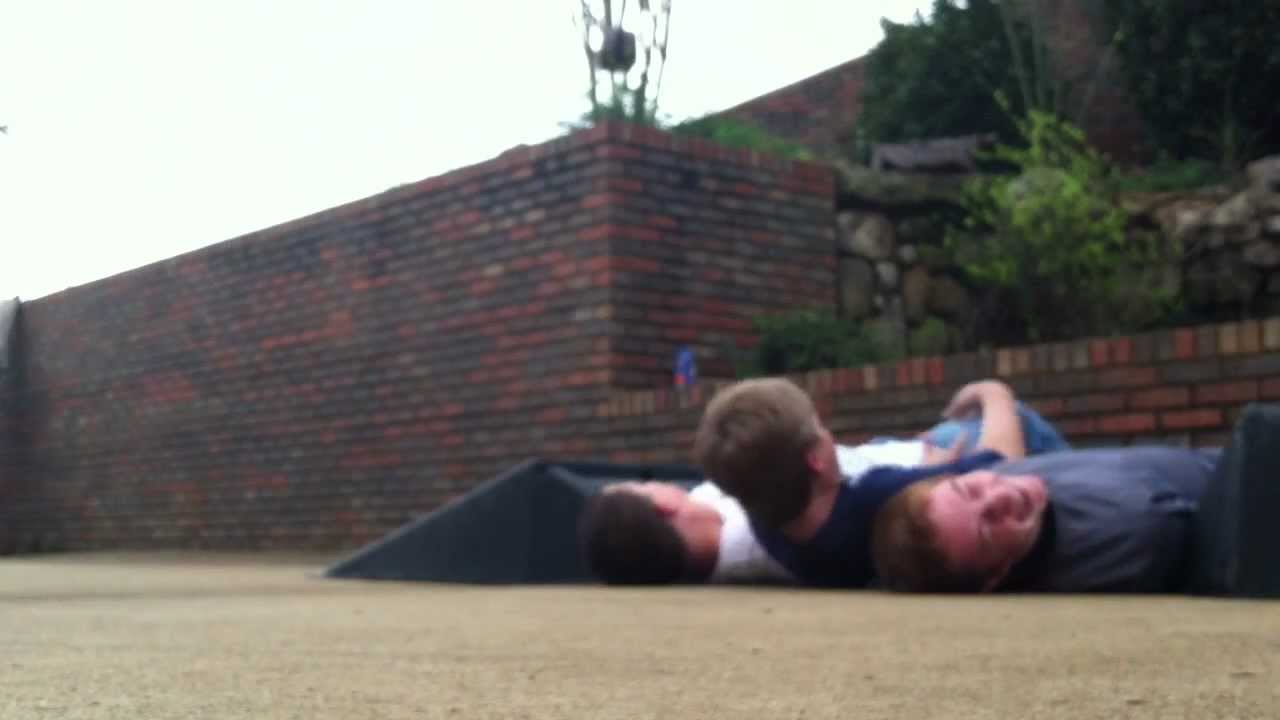 kid jumps over 3 people on bike! - YouTube