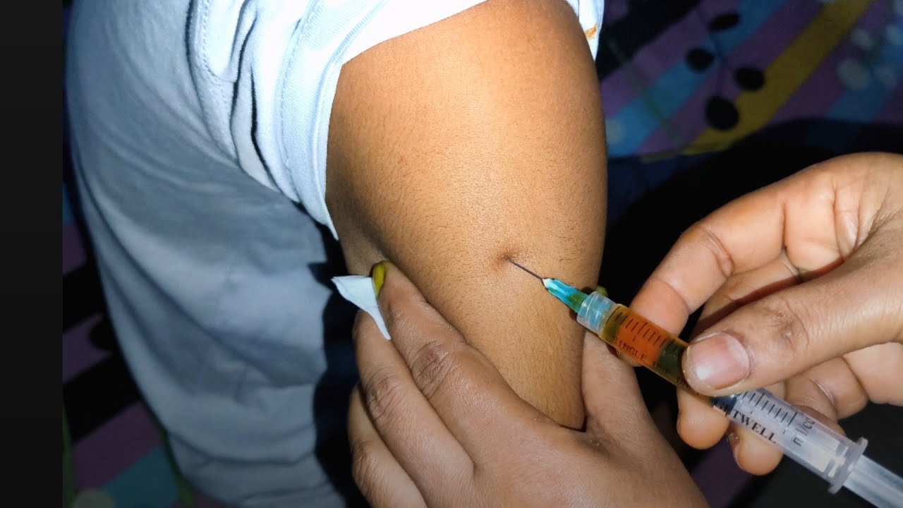 Arm intramuscular (IM)injection push. Vitamins B complex injection the ...
