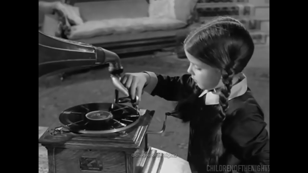 Wednesday & Lurch dancing to Joy Division - YouTube