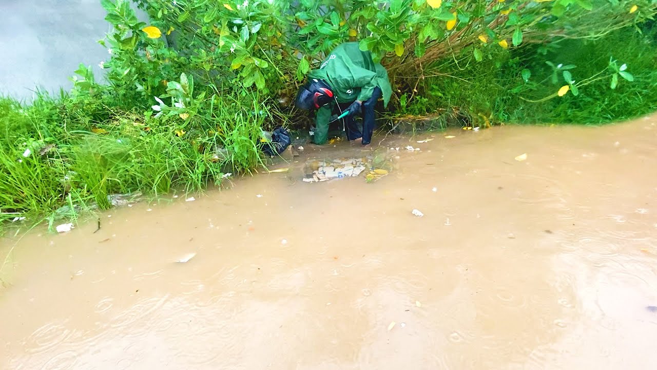 Fixing Flooded Culverts Debris Removal for Unclogging Drain - YouTube