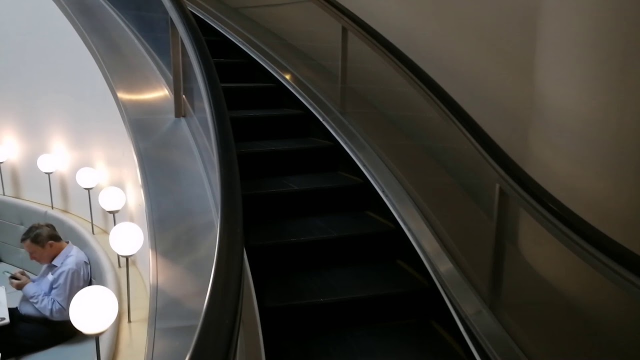 Riding a curved escalator - YouTube