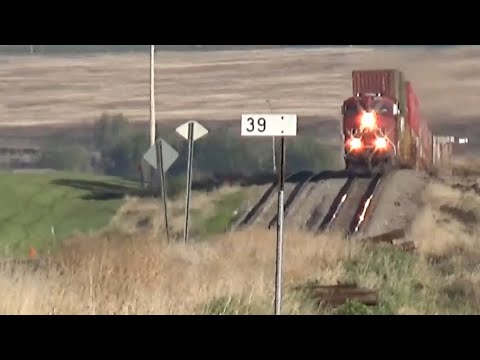 Over The Hills At Carstairs. CP 9358 Leads CP 119 (Intermodal/Mixed) North At Crump, CP Red Deer ...