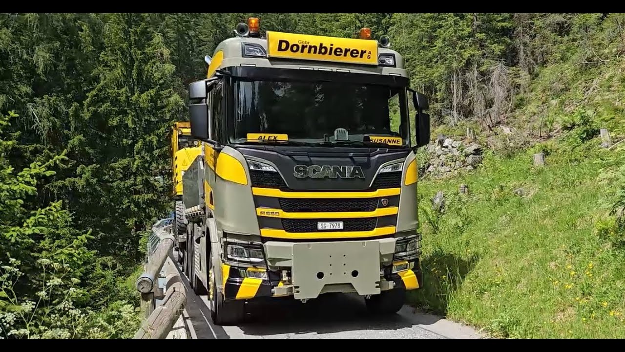 Bagger mit dem SCANIA R650 bei RhB Station Davos Laret verladen - YouTube