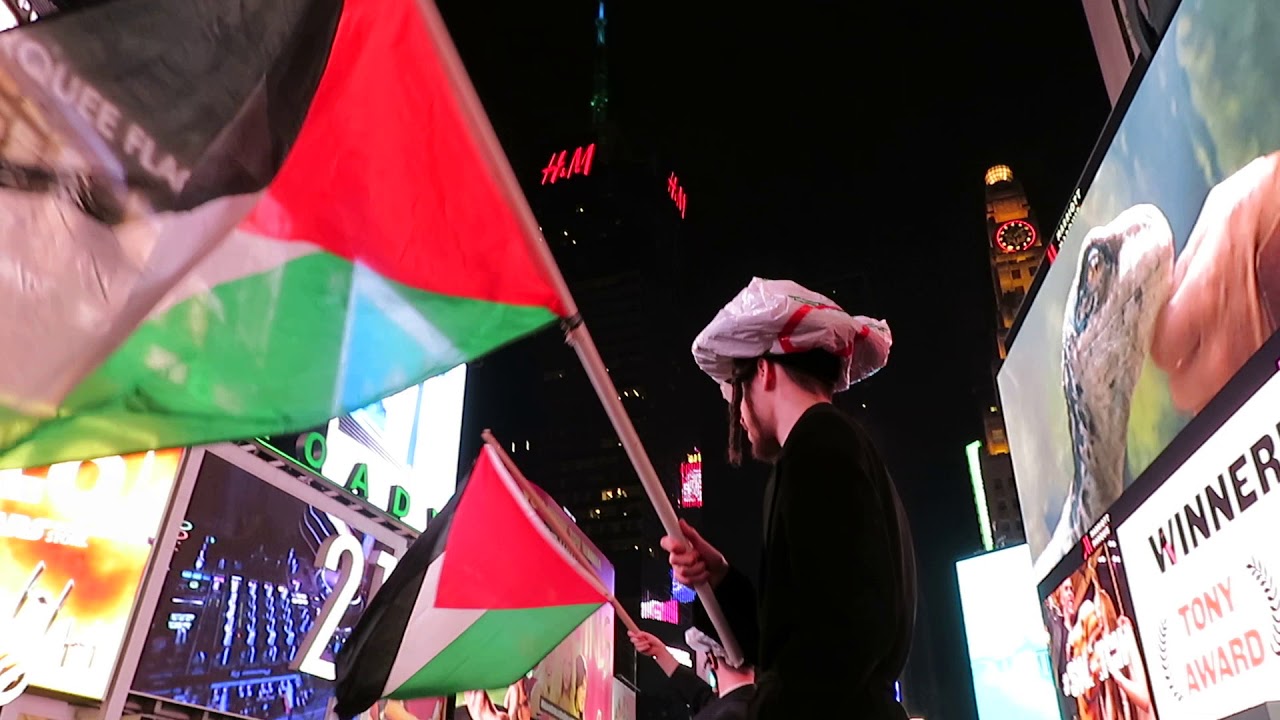 Times Square at Israeli 70th block party, turns red green black and ...