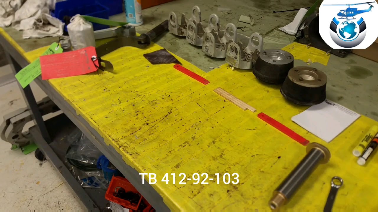 Bell 412 M/R blade expandable bolt maintenance - YouTube