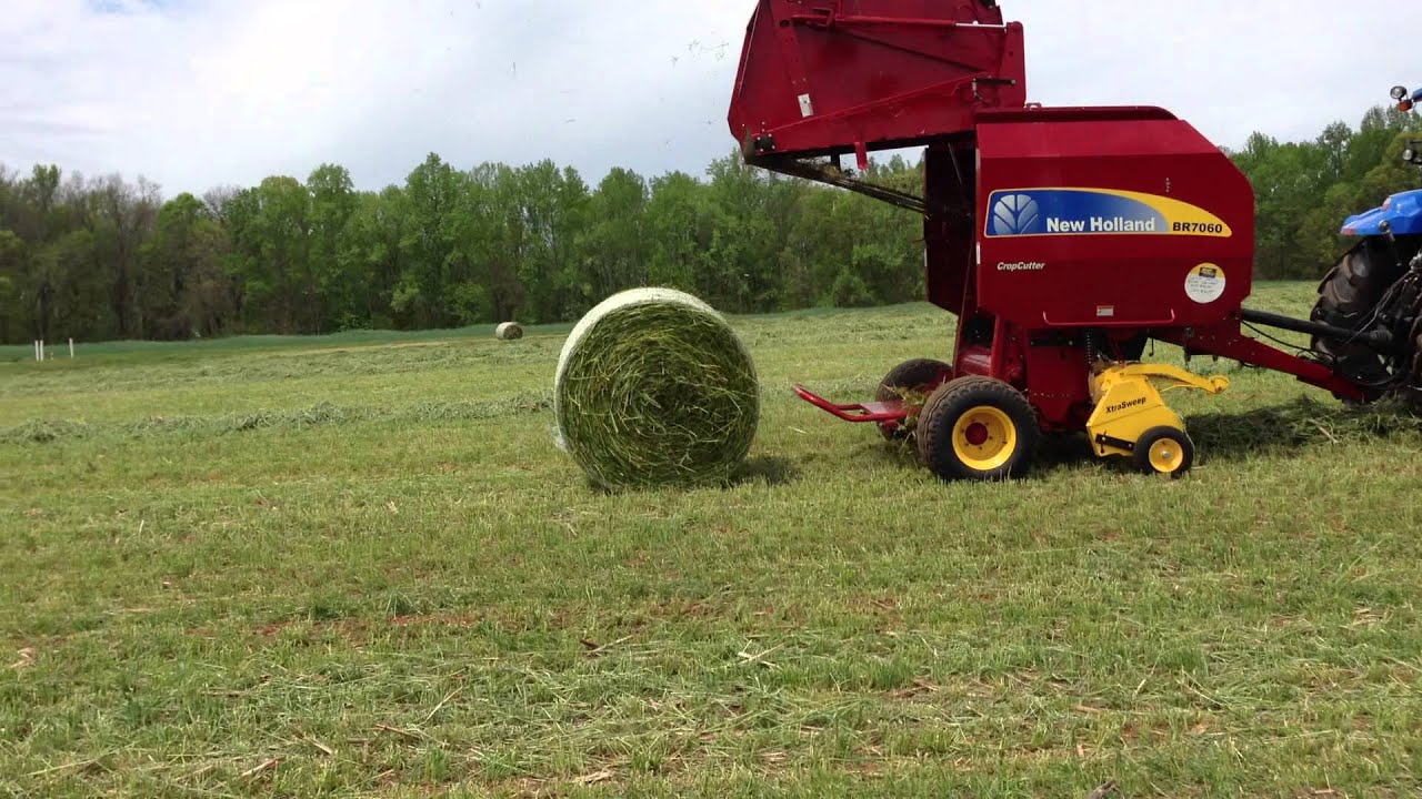 New Holland BR7060 Crop Cutter Round Baler powered by T6.155 Tractor ...