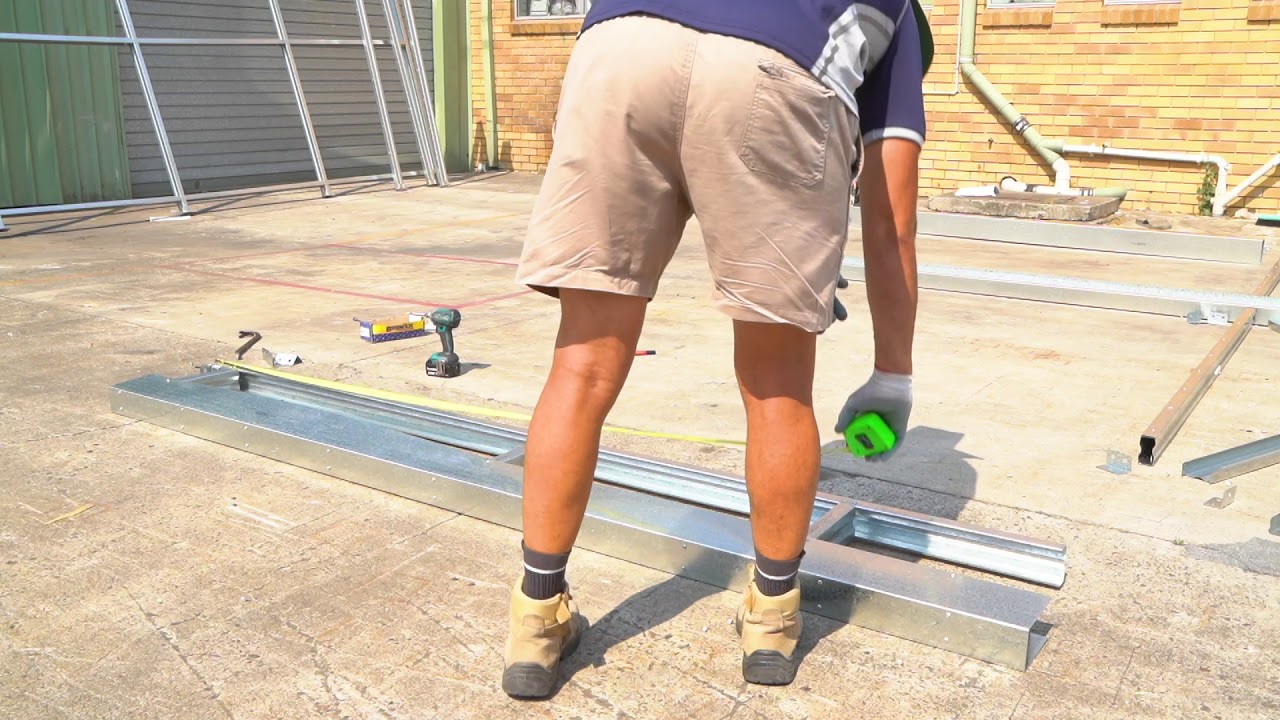 Absco Sheds - Double Roller Door Garage - Front Frame Assembly - YouTube