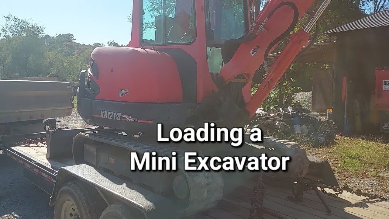 Loading a Mini Excavator on a Trailer - YouTube
