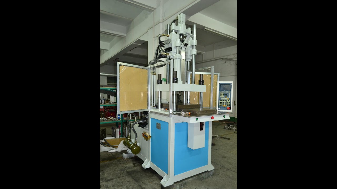 single slide vertical injection molding machine - YouTube