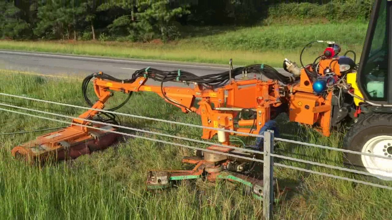 Envirokut Cable Barrier Mower by Mulag on a Multihog Carrier - YouTube