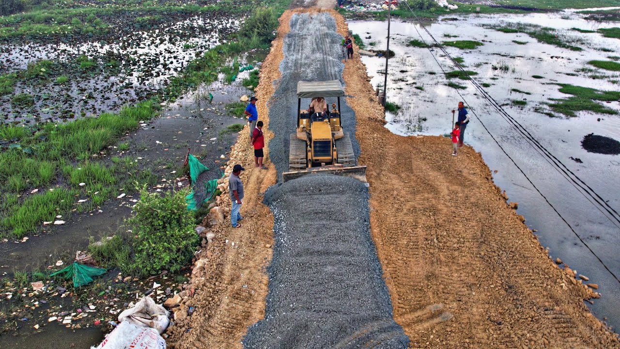 Making New Road For Poor Site In The City With Small Bulldozer ...