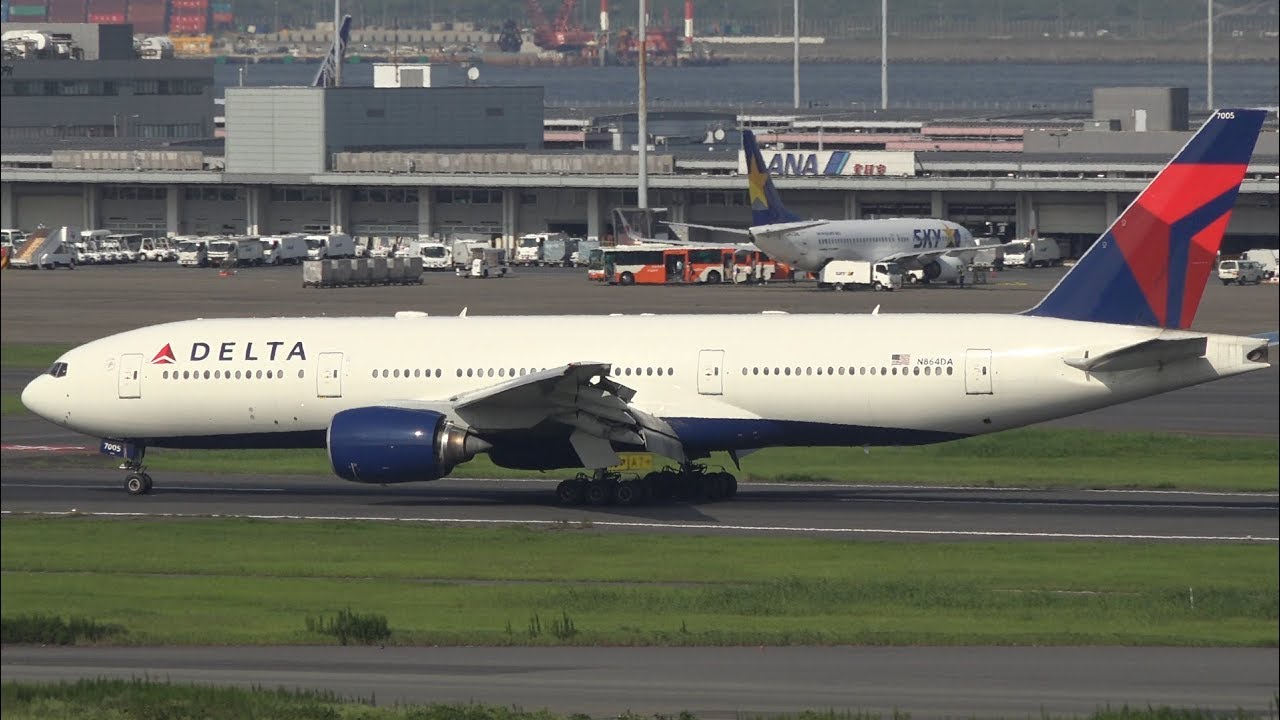 Delta Air Lines Boeing 777-200ER N864DA Landing at HND 34L - YouTube