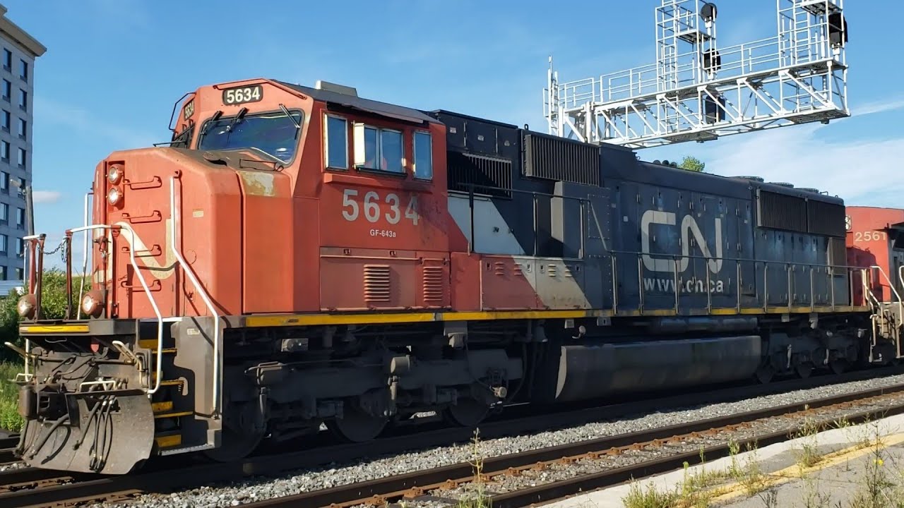 TRAINS CN Freight With Vintage SD75I Departs Dorval - YouTube