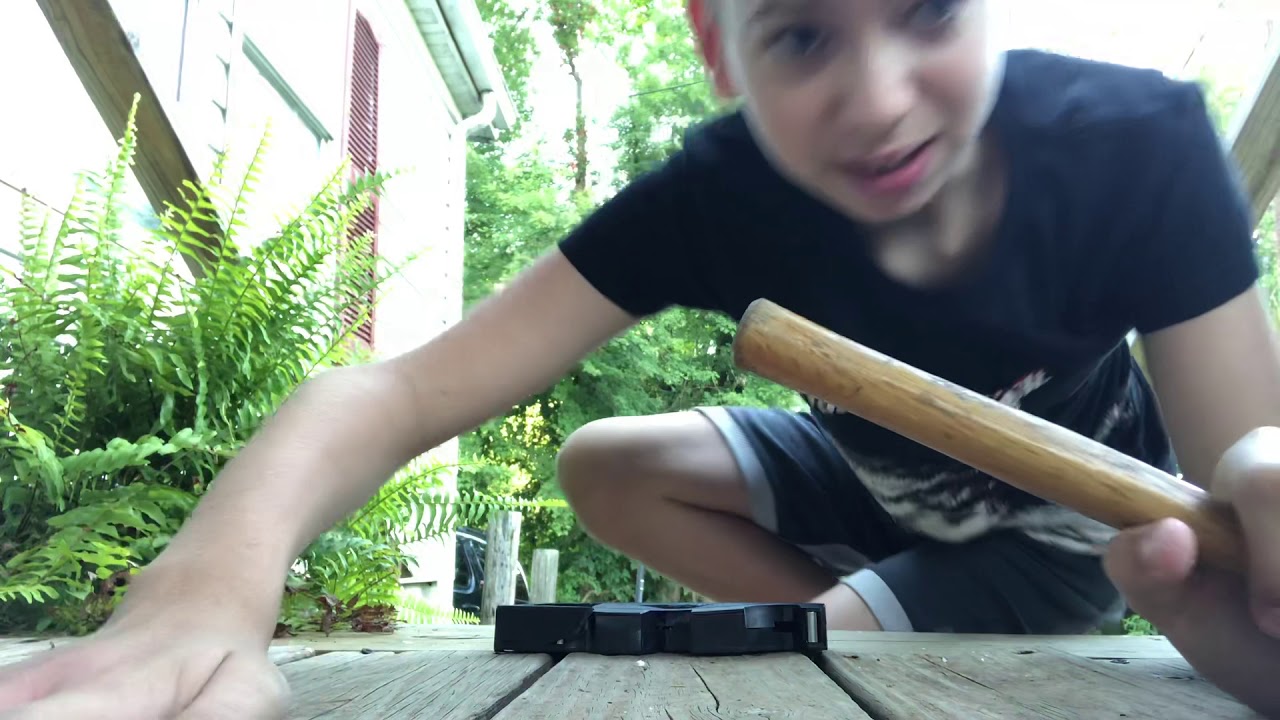 Bored smashing broken vhs tape - YouTube