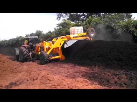 Palm oil EFB compost & MENART tow-behind turner - YouTube