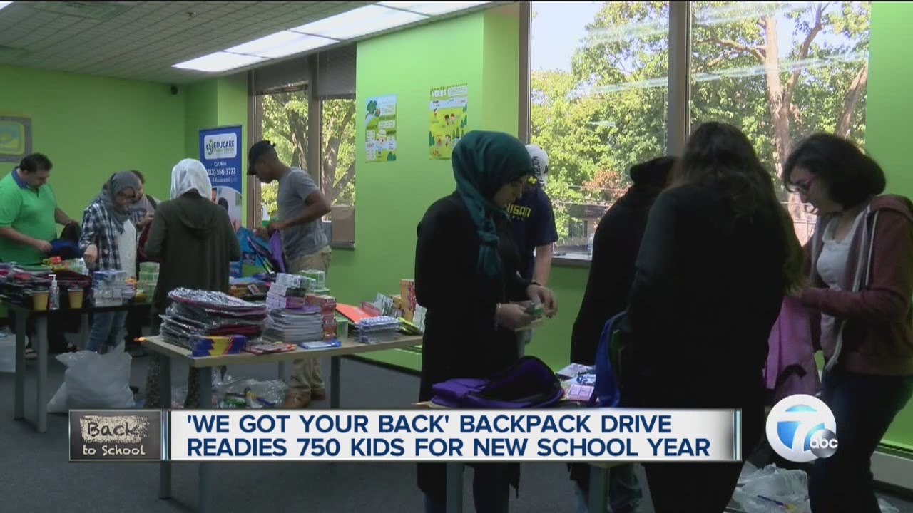 Volunteers fill hundreds of backpacks for kids in need - YouTube