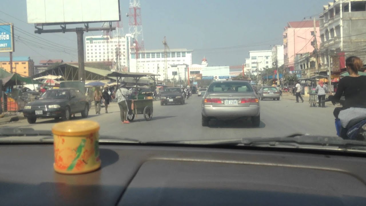 Poipet - Aranyaprathet land border crossing Thailand - Cambodia - YouTube