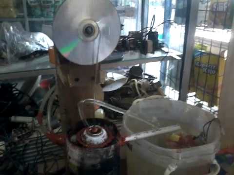 Stirling Engine with water pump - YouTube