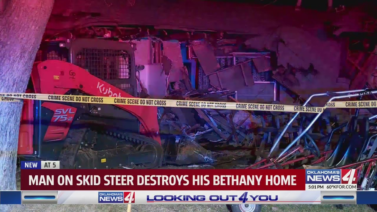 Man in custody after 'bulldozing' home - YouTube