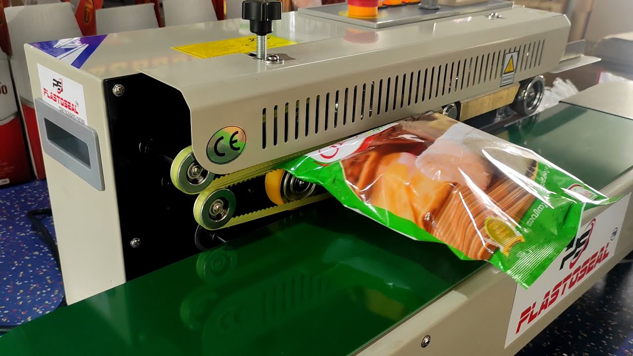Continuous Band Sealer | Plastoseal Packaging | Automatic plastic ...