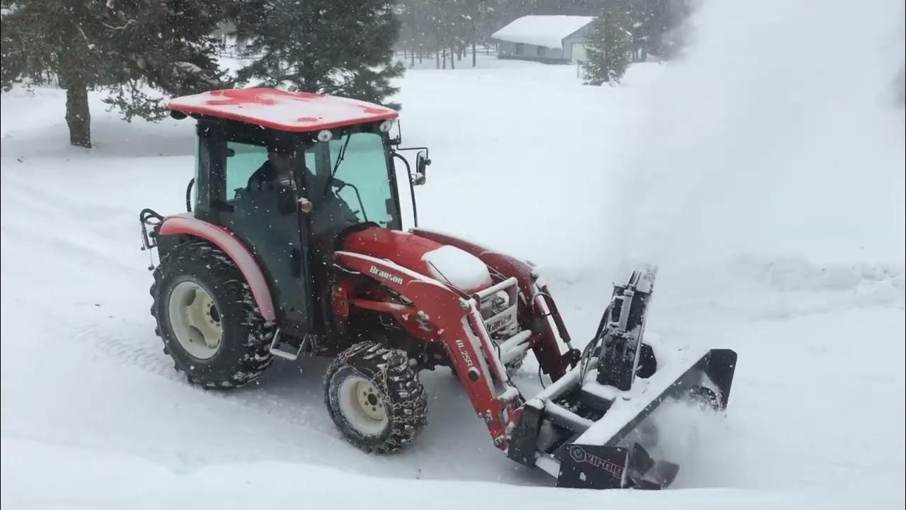 Front mounted hydraulic snow blower on tractor with PTO mounted ...