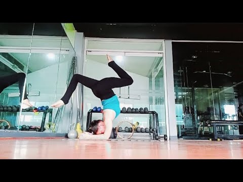 Pincha Mayurasana in staggered legs - YouTube