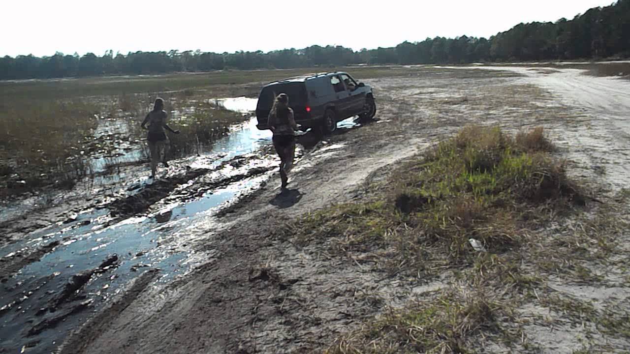 Girls getting splashed in the mud. - YouTube
