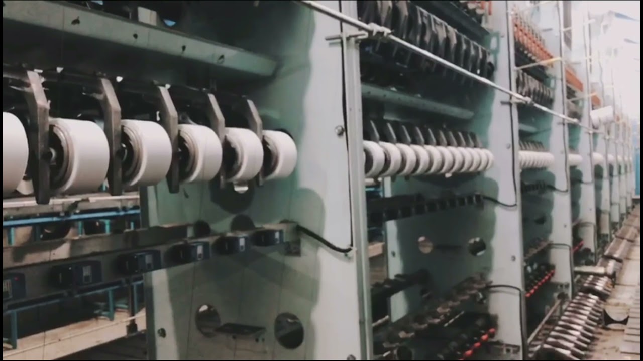 The production process of air covered yarn - YouTube